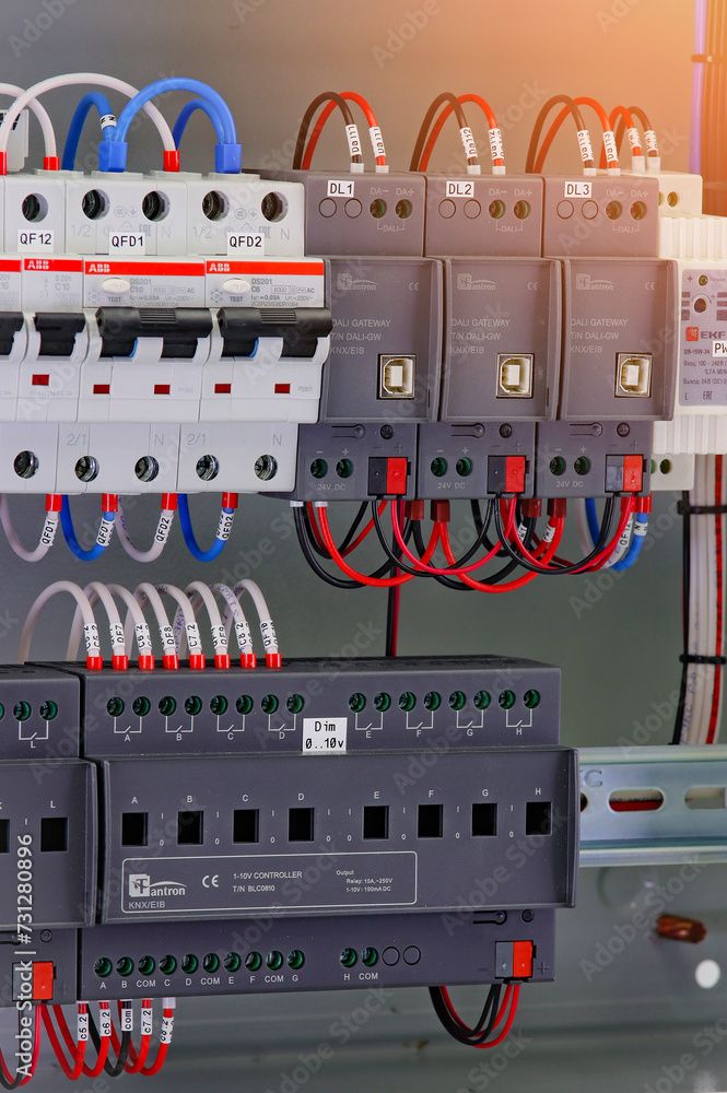 Electronic control modules for apartment automation are installed in an ...