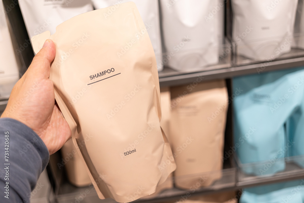 Customer choosing Refill packet. Zero waste. Reuse reduce recycle ...