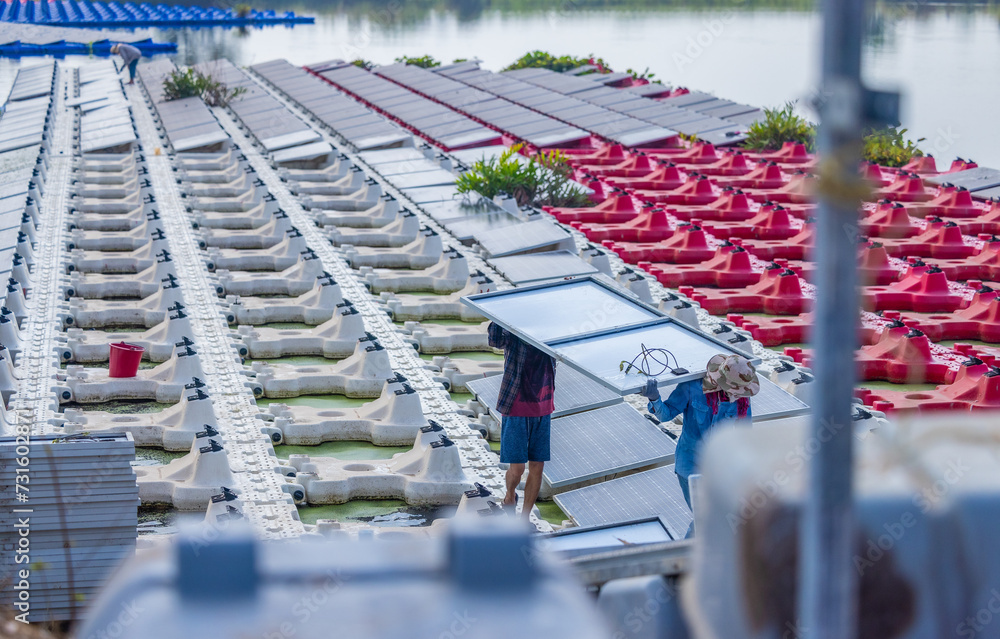 Diligent Team At Work Installing a Sustainable Future on a Floating ...