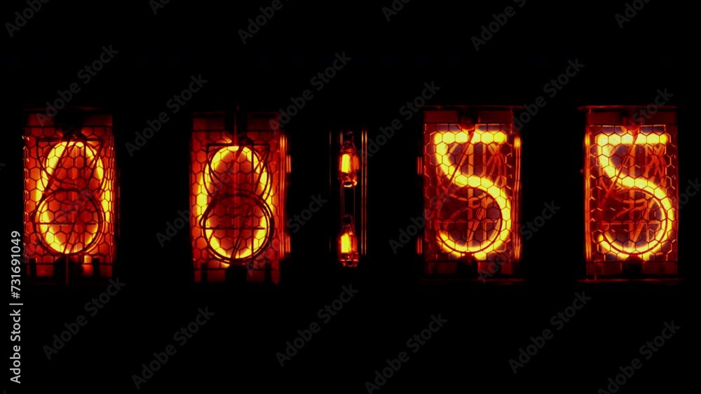 One-minute countdown. Retro vacuum tube display on the vintage lamp ...