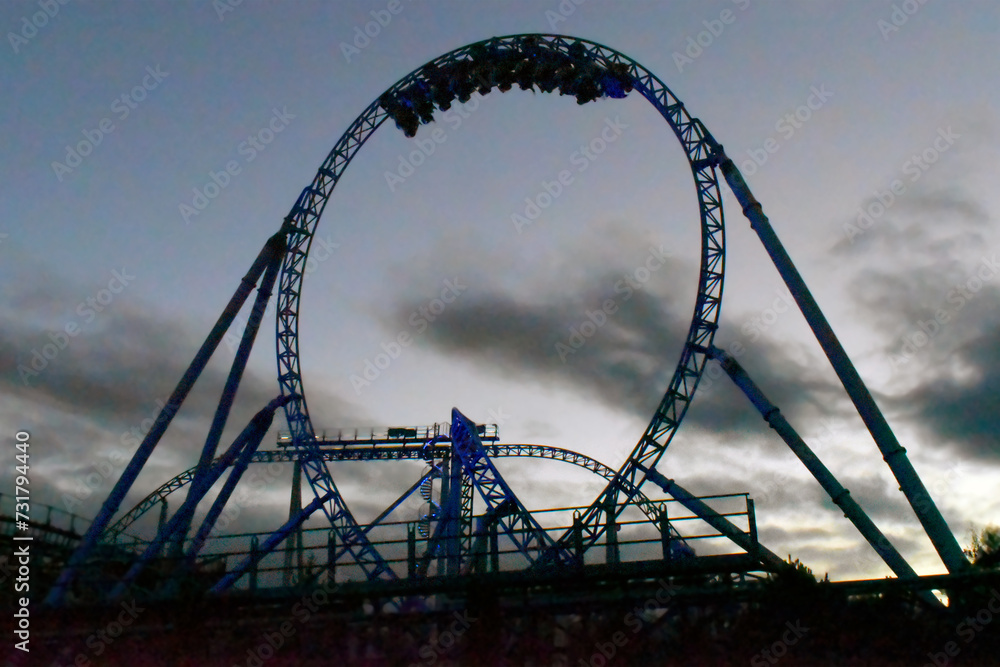 A Europa Park roller coaster soars through the air, flips upside down ...