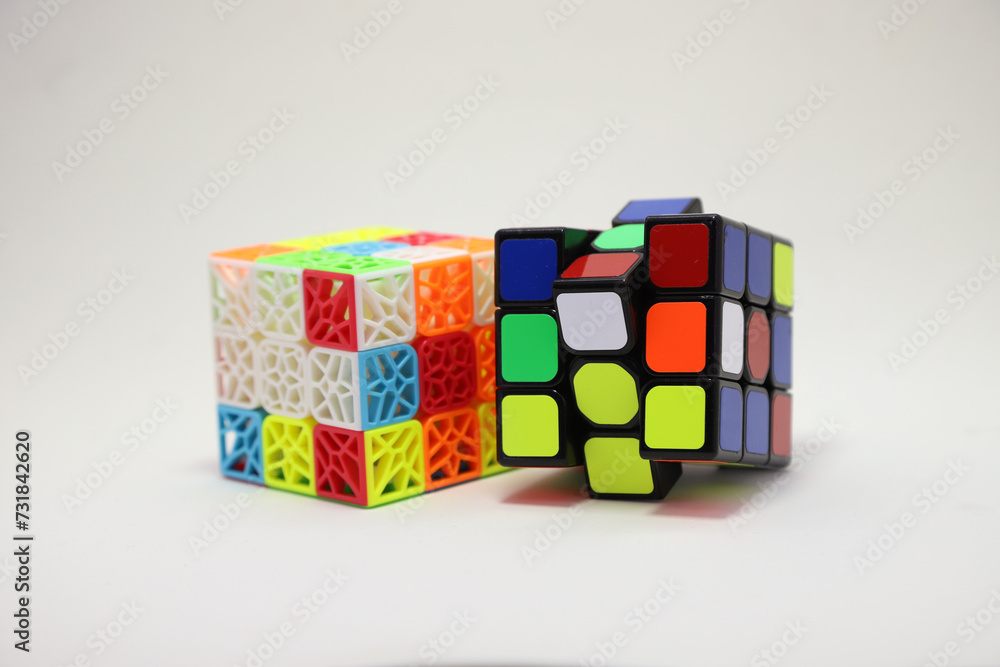 Two Rubik's cubes on isolated white background. Traditional rubik cube ...