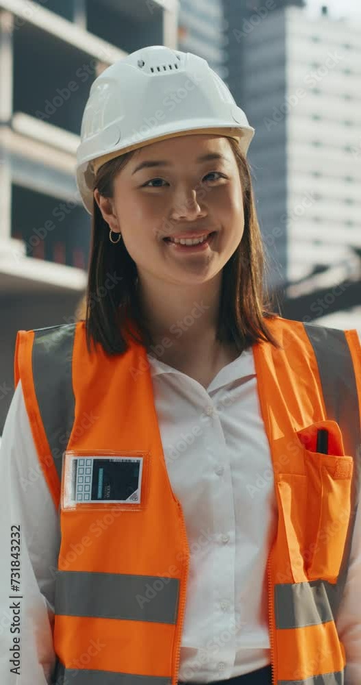 Vertical Screen: Heavy Industry Asian Engineer Wearing Safety Uniform ...