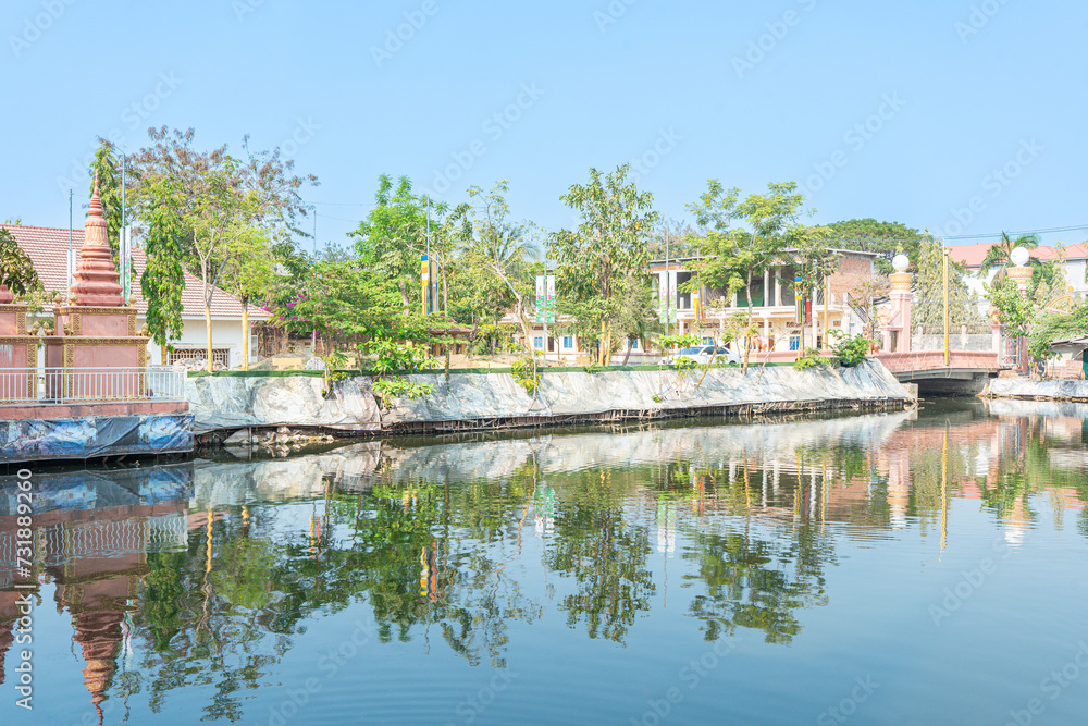 Serene Khmer Temple by the Water in a Lush Garden Setting, Blending ...