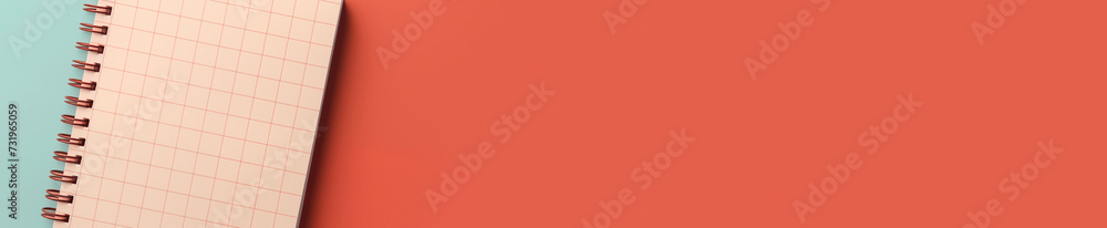 Checked notebook on an orange background. Notepad or diary. Notepad ...