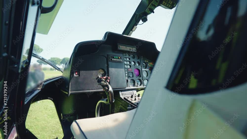 Dolly in shot of helicopter cabin with necessary commands buttons and ...