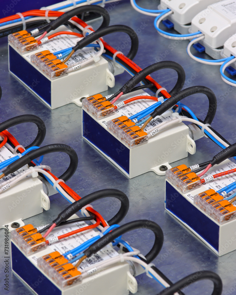 Electronic control modules for apartment automation are installed in an ...