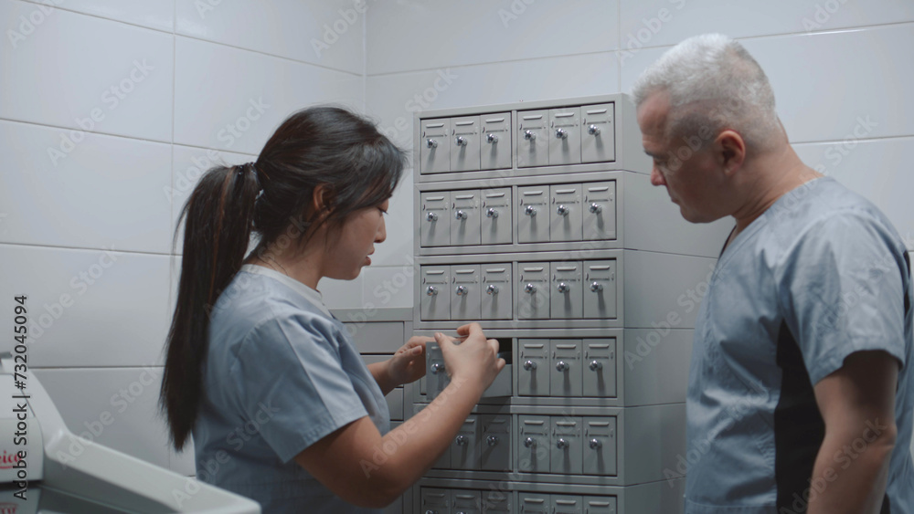 Diverse scientists check samples of blood tests or histology biological ...