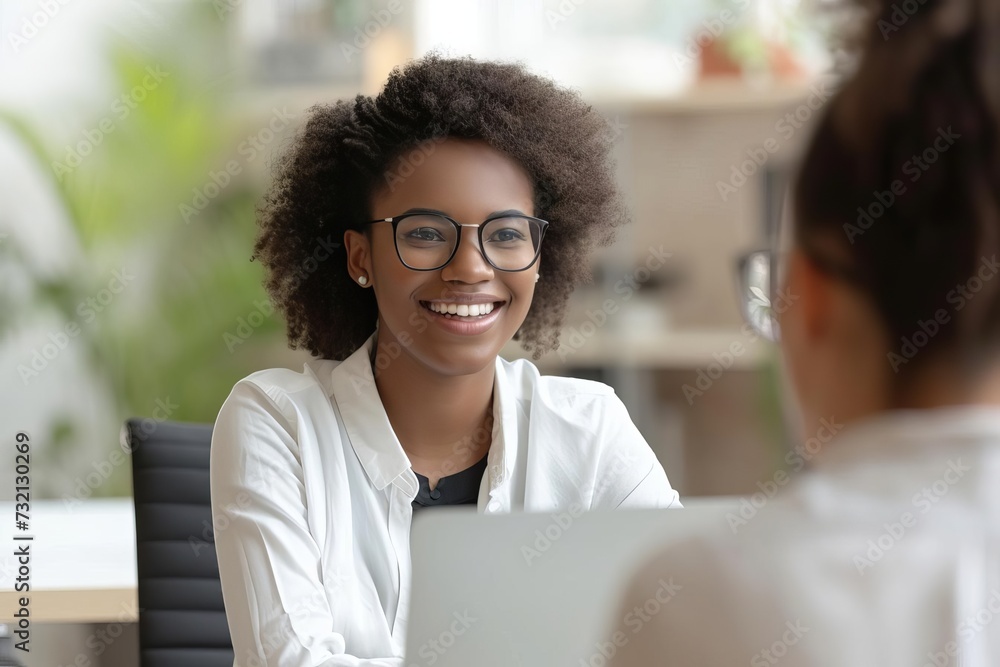 Professional interview in an office setting With a smiling female ...