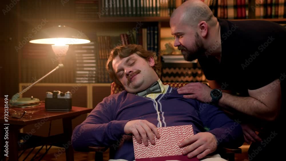 Man Sleeping In Chair In Vintage Clothes Another Guy Comes Up And Kiss