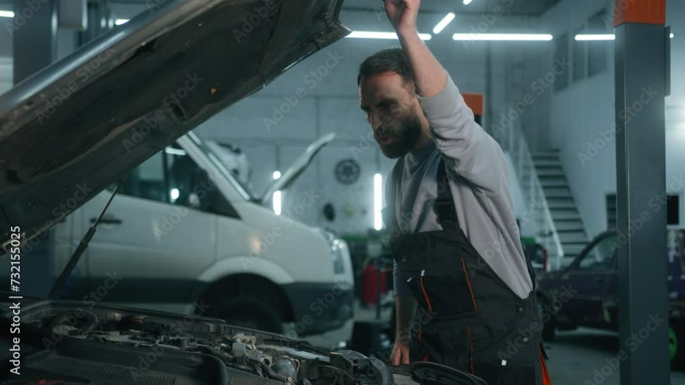 Confused shocked Caucasian guy man auto mechanic male repairman open ...