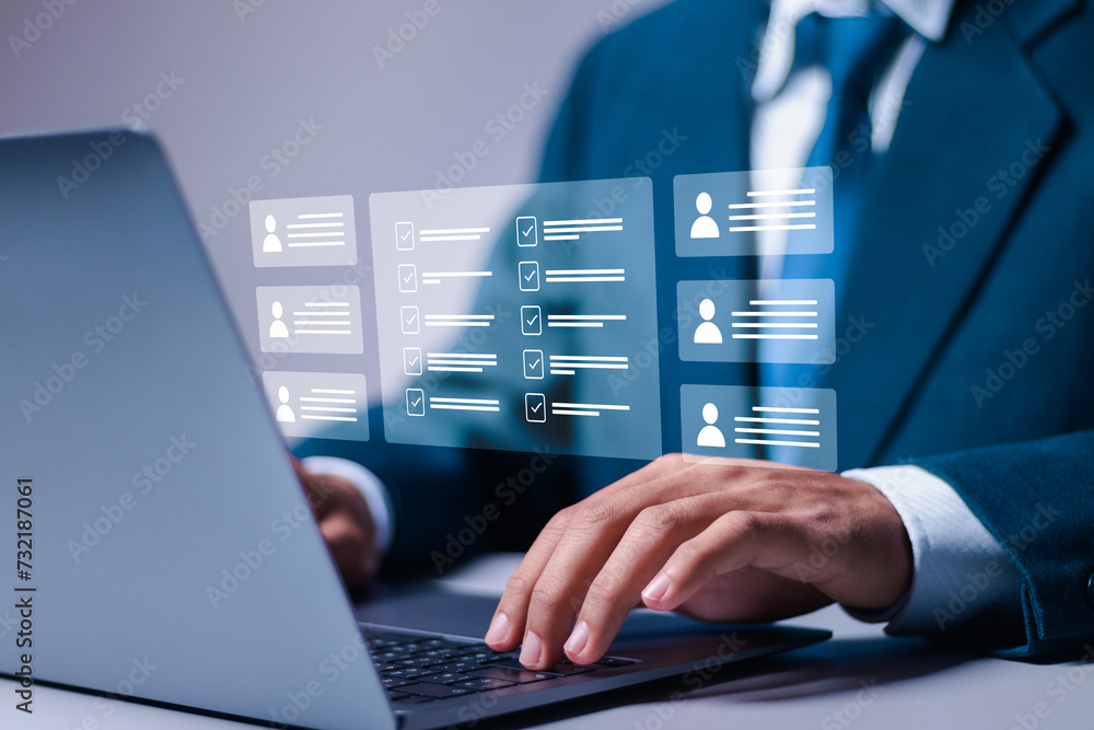 Human resource management (HR) concept, Businessman use laptop filling ...