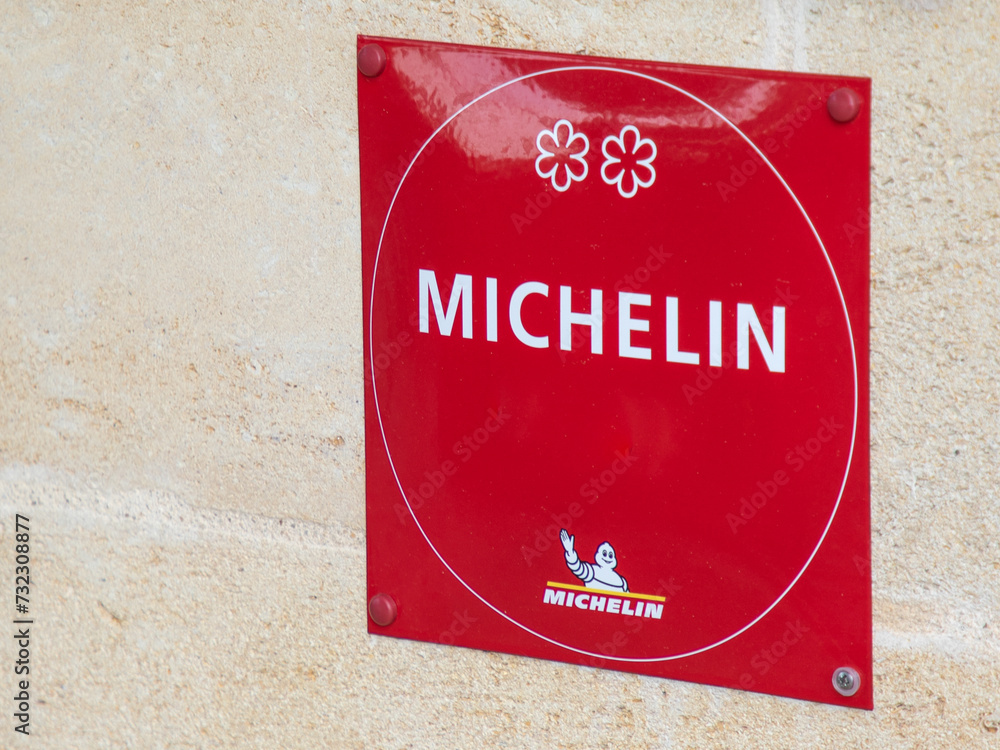 Michelin two stars restaurant logo sign and text brand of guides books ...