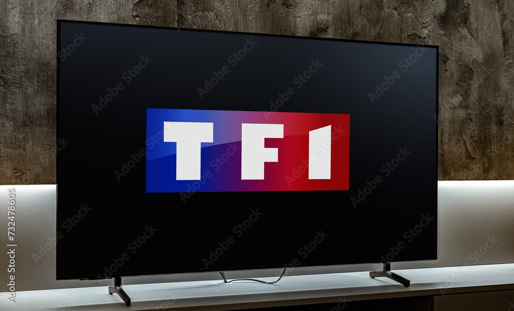 Flat-screen TV set displaying logo of TF1 Stock Photo | Adobe Stock