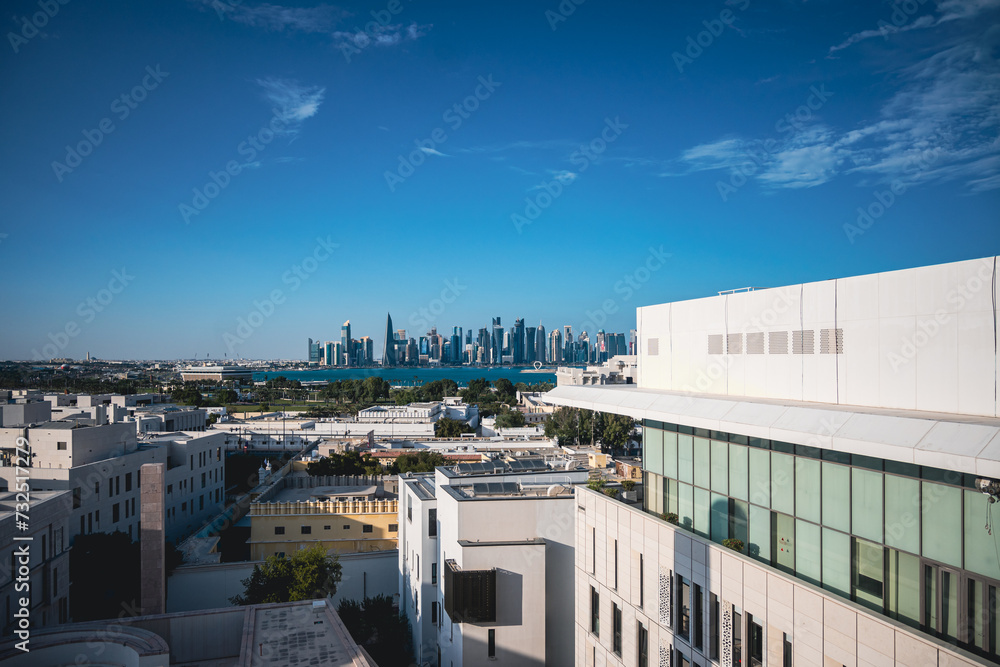 Doha, Qatar - February 3, 2024 -Doha Towers with water in front of them ...