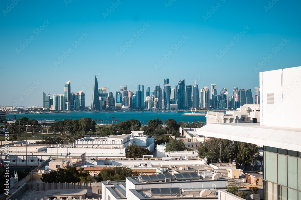 Doha, Qatar - February 3, 2024 -Doha Towers with water in front of them ...