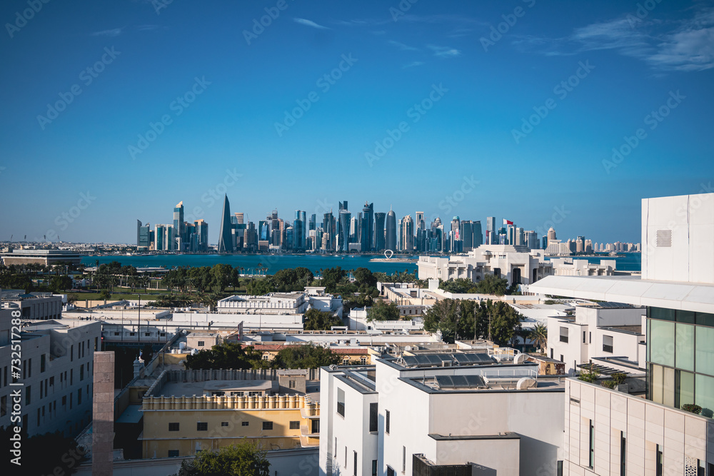 Doha, Qatar - February 3, 2024 -Doha Towers with water in front of them ...