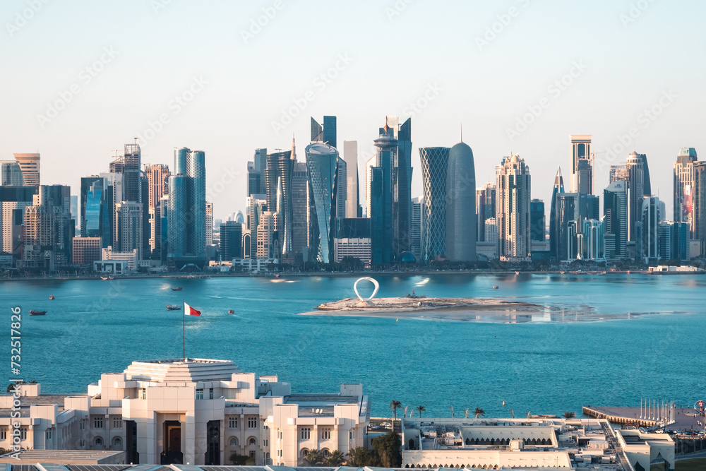 Doha, Qatar - February 3, 2024 -Doha Towers with water in front of them ...