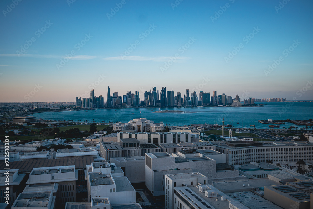 Doha, Qatar - February 3, 2024 -Doha Towers with water in front of them ...