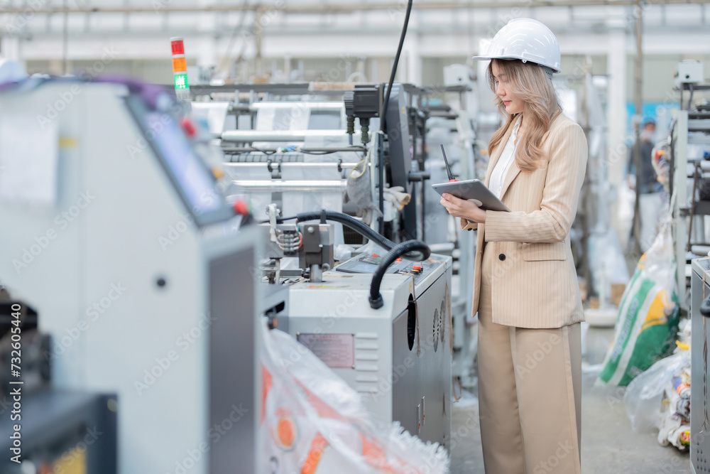 The operator was an Asian female engineer, department head, standing ...