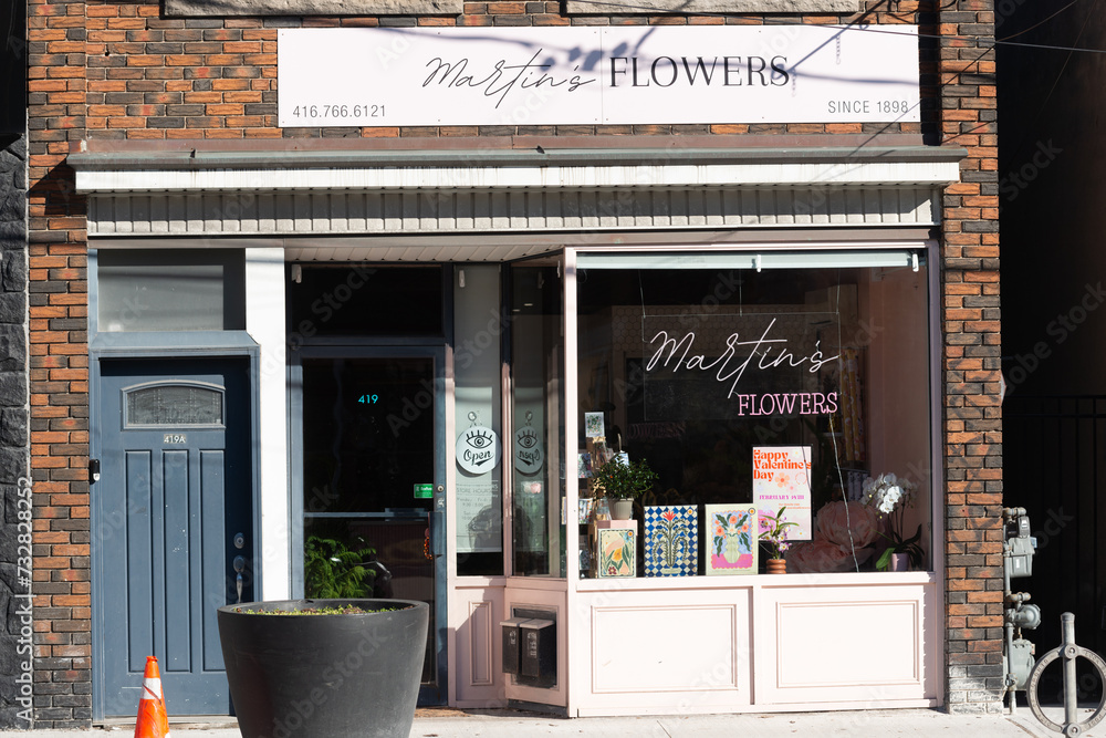 exterior building facade entrance display window and sign of Martin's ...