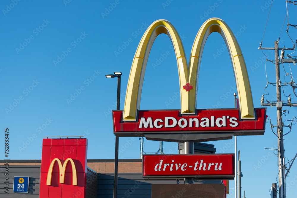 exterior signs of McDonald's, a fast food restaurant chain, located at ...