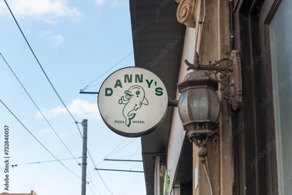 exterior projecting sign of Danny's Pizza Tavern, a pizza restaurant ...