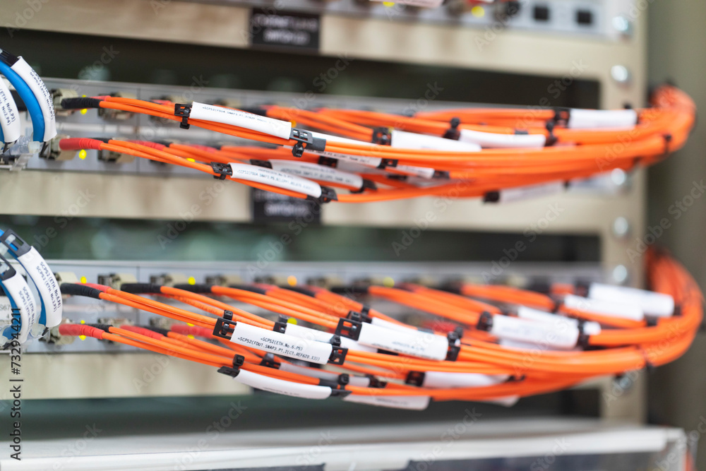 Fiber Optic cables connected to an optic ports in a data center Stock ...