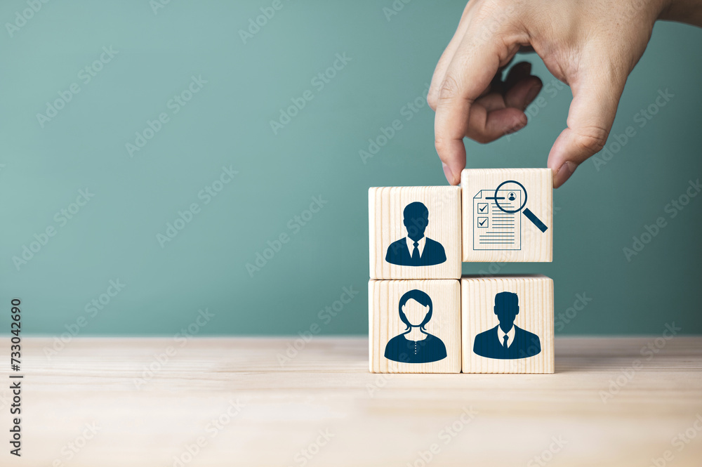 Candidate selection and evaluation. Wooden blocks with human icons and ...