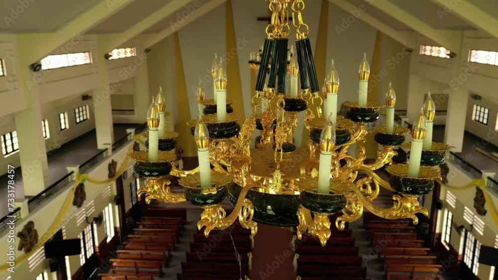 Top view inside the catholic church. Top view on the Large chandeliers ...