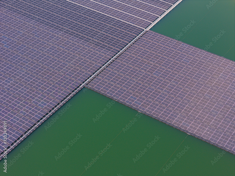 Power panels for green energy. Floating solar panels or solar cell Platform system on the lake ...