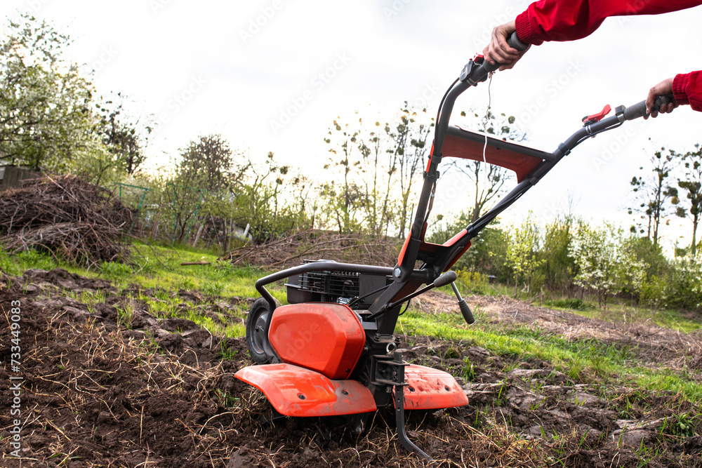 Cutting-edge agricultural technology at play: the tiller meticulously ...
