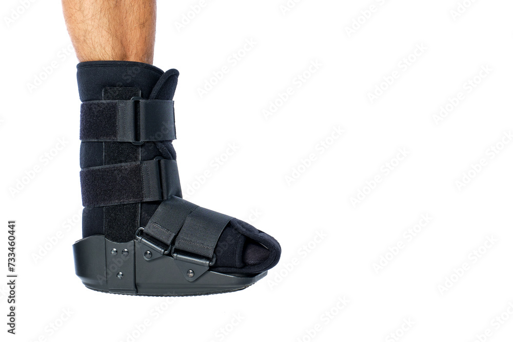 man's leg in profile with an orthopedic boot for breaks and sprains on ...