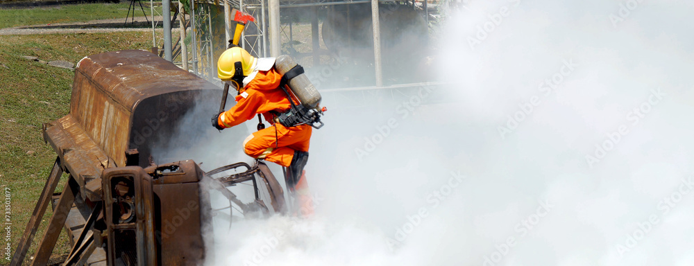 Firefighter Rescue training in fire fighting extinguisher. Firefighter ...