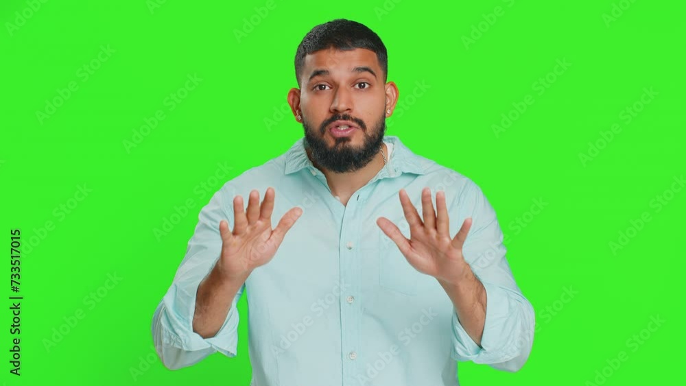 Hey you, be careful. Strict Indian man warning with admonishing hands ...