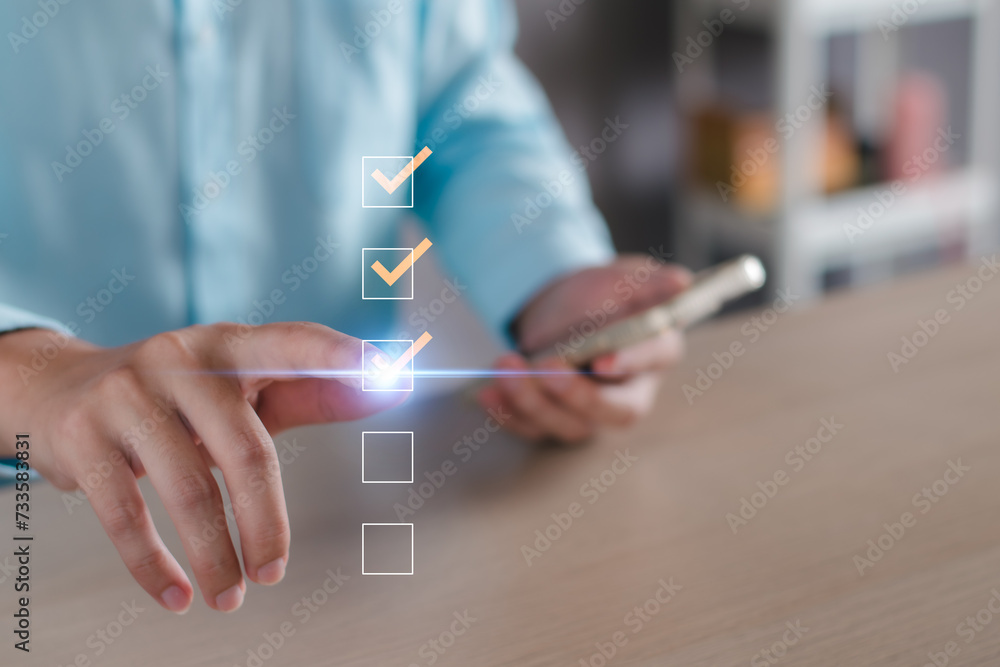 Check list concept. Businessman tick off questionnaire, survey, test ...