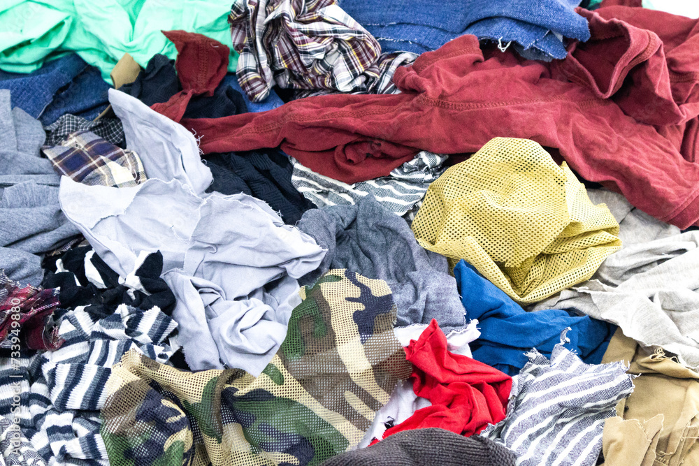 Textile scrap background. Lots of textile fabric scraps. Textile waste ... Textile scrap background. Lots of textile fabric scraps. Textile waste ...