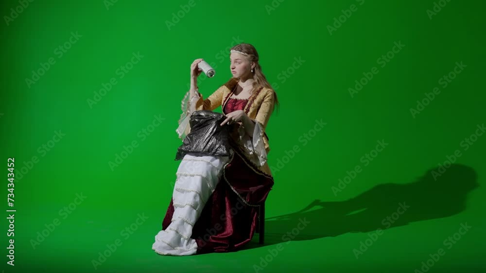 Woman in ancient outfit on the chroma key green screen background ...