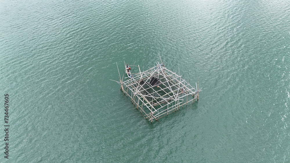 Indonesians call it "bagan" Bamboo rafts are assembled in the middle of ...