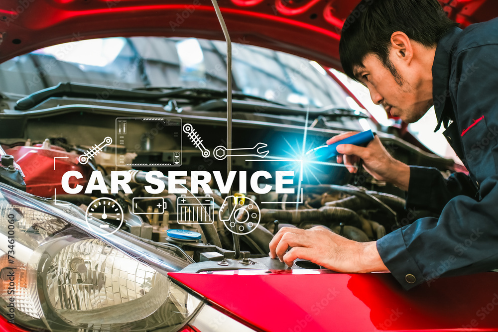 mechanic inspection Shine torch car engine checking bug in engine from ...