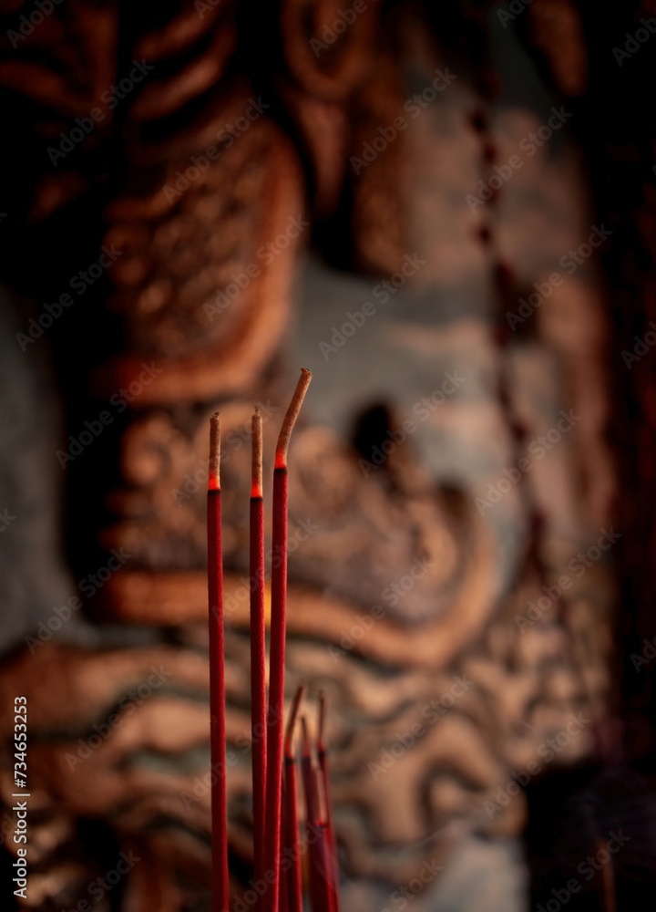 Burning prayer sticks fill the room as smoke billows from the prayer ...