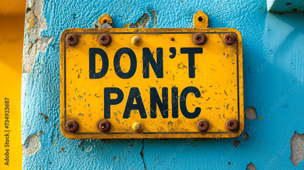 Bright yellow cautionary sign with bold black letters spelling DON'T ...