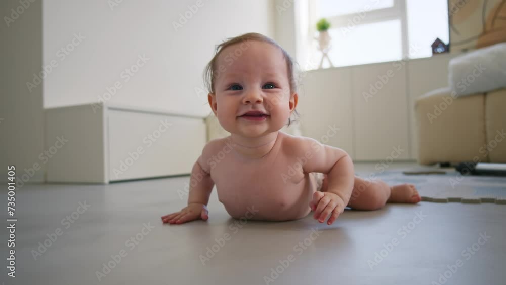 Infant in a cozy indoor setting, exploring the environment on all fours ...