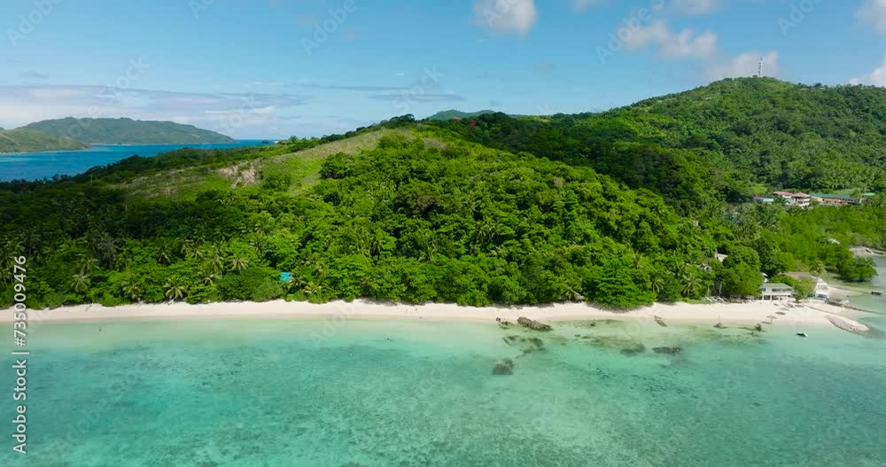 Drone view of Tiamban Beach and Nonok Beach Resort with white sand and ...