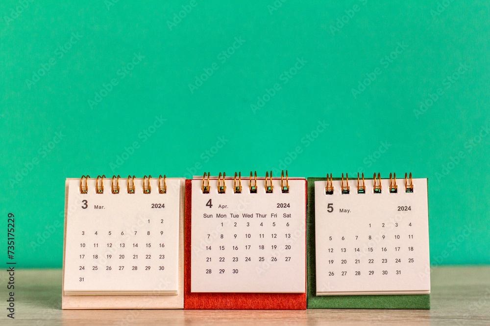 Desk calendar for March, April, May 2024 on the table. Spring calendar ...