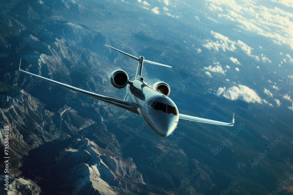 Private jet flying over mountainous terrain. Business aviation concept ...