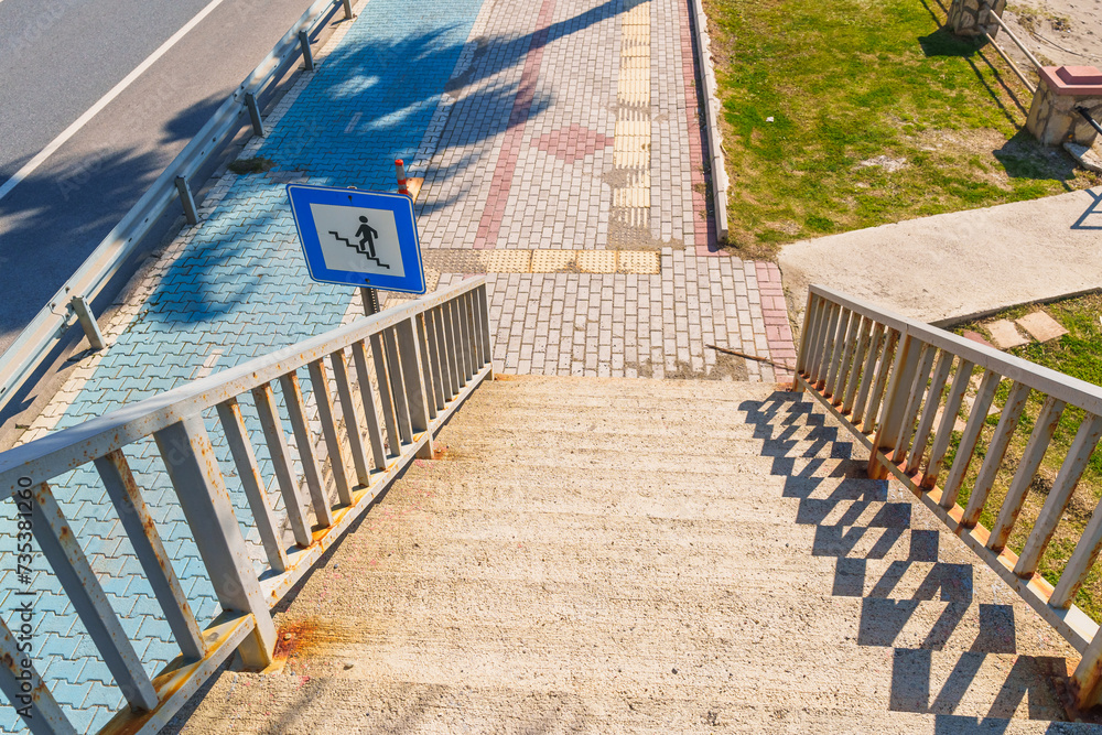 Downward shot of a Concrete Cement Pedestrian Stairway Bridge, Stone ...