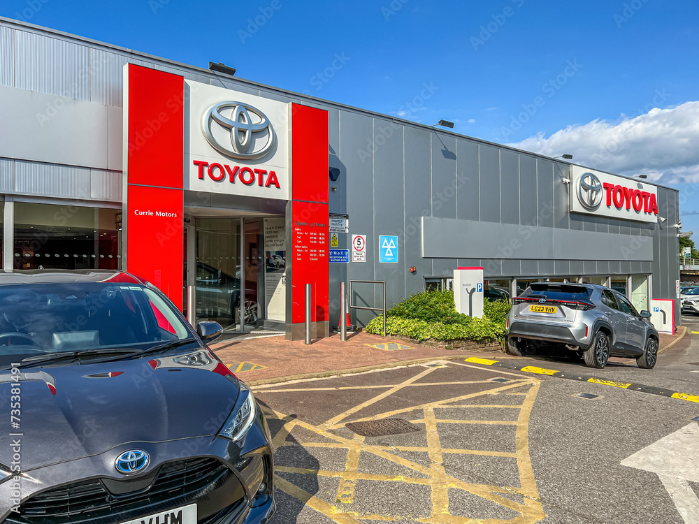 The dealership shop of Toyota in London. Toyota Motor Corporation is ...