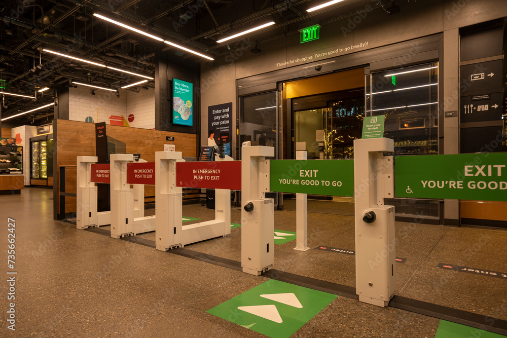 Seattle, WA, USA - Dec 20, 2023: Swing gates at the exit of an Amazon ...