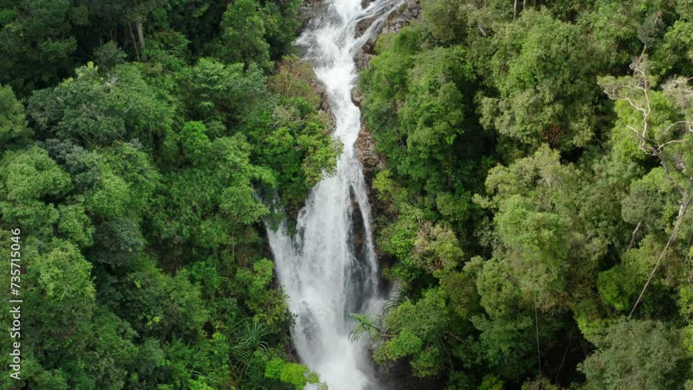 Waterfall in tropical rainforest jungle, falling water hitting water ...